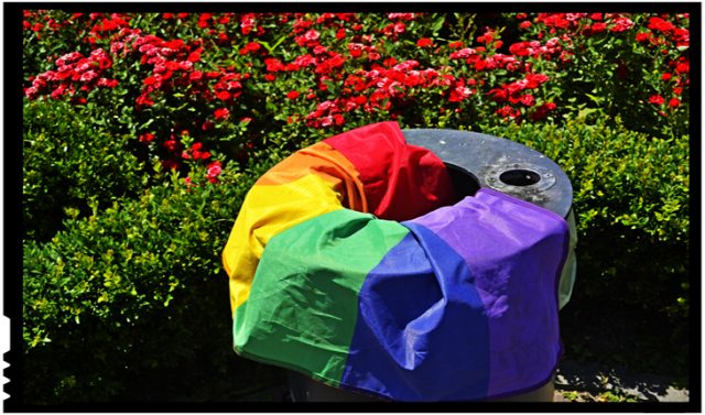 Steagul LGBT călcat în picioare, folosit ca preș, aruncat la gunoi și ...